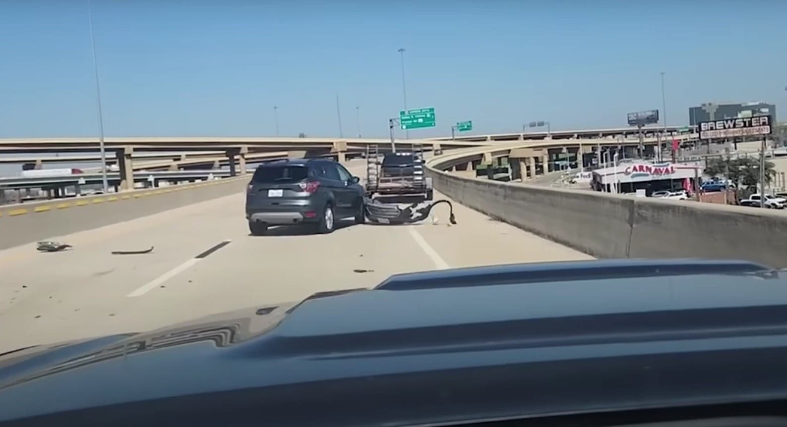 Ram pickup tears off Ford Escape's bumper on Dallas highway after brake ...