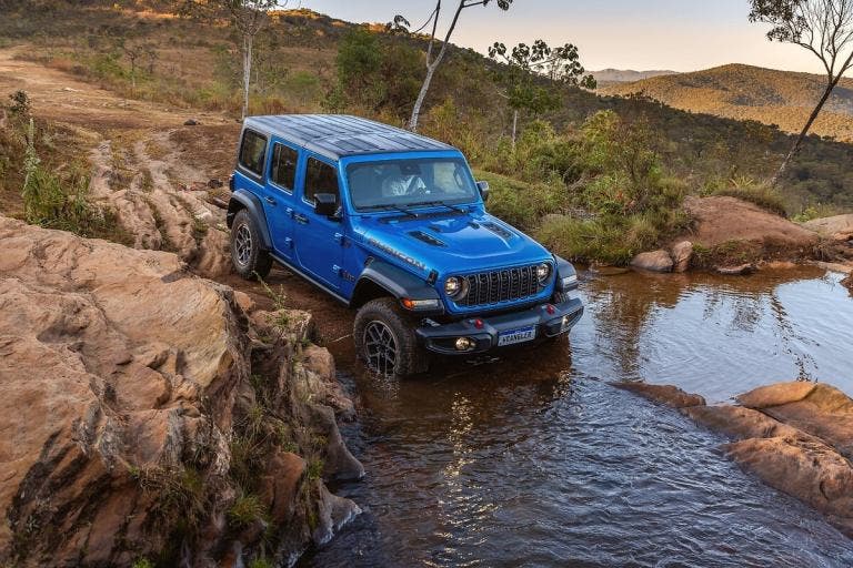 The new Jeep Wrangler, featuring a redesigned grille inspired by the ...