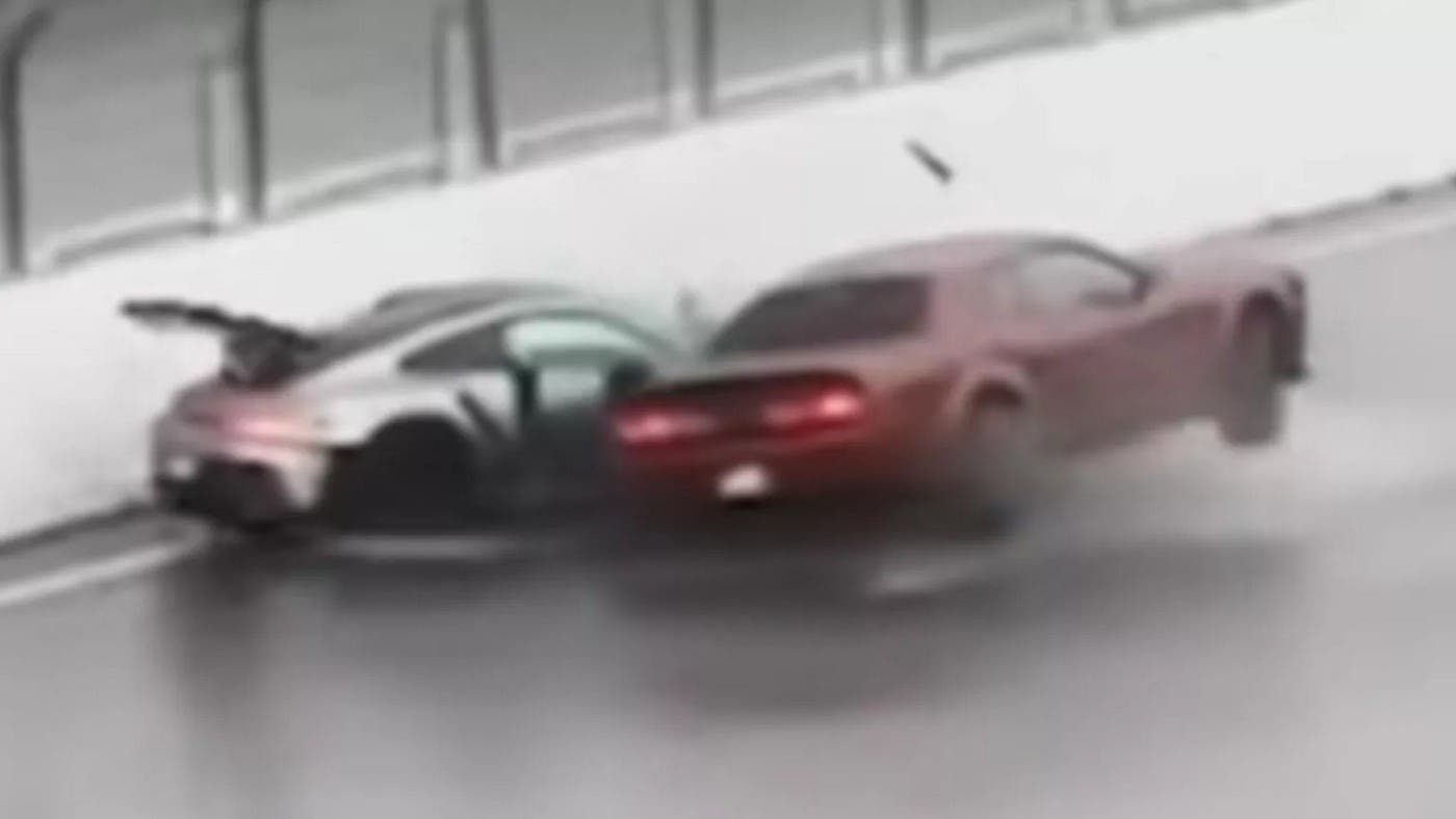 Dodge Challenger crashes into a Porsche 911 GT3 RS during a track day ...